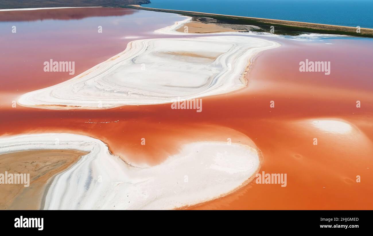 Aerial view of beautiful Red Lagoon (Red Lake) and salt islands ...