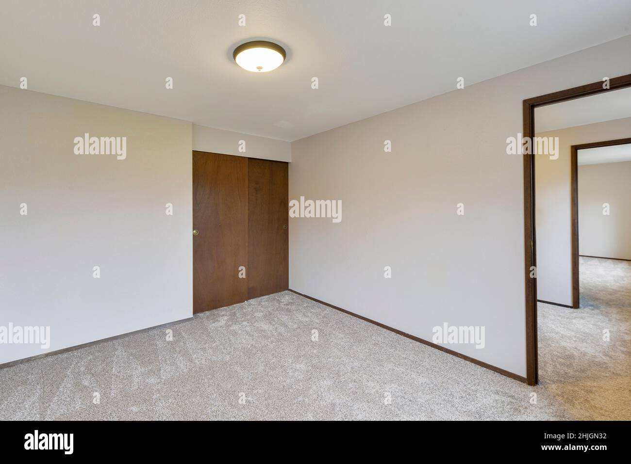 Modern residential empty bedroom interior Stock Photo - Alamy