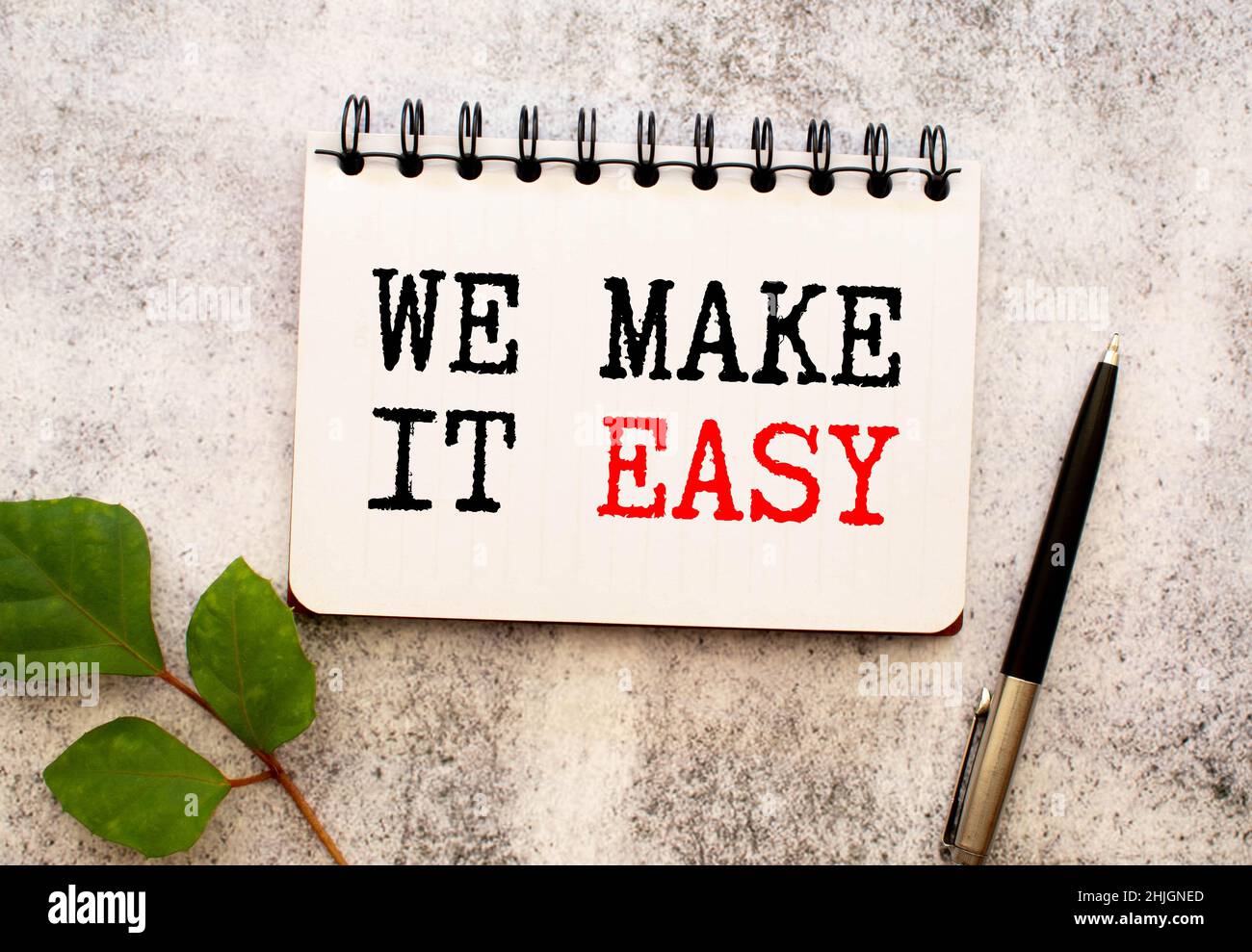 We make it easy text on white notepad paper on white background NEXT TO ...
