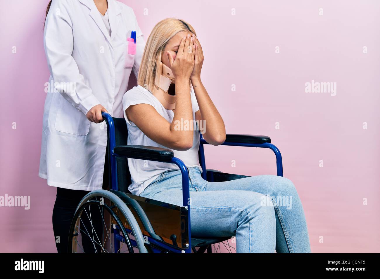Beautiful blonde woman sitting on wheelchair with collar neck with sad ...