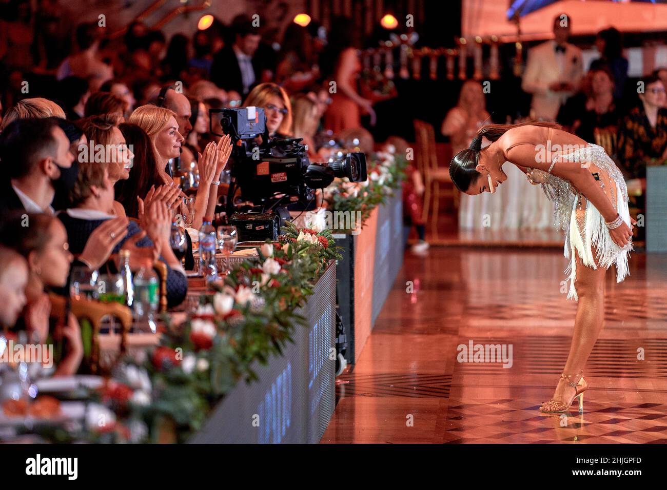 A dancer bows to the audience at the end of her performance at the 25th ...