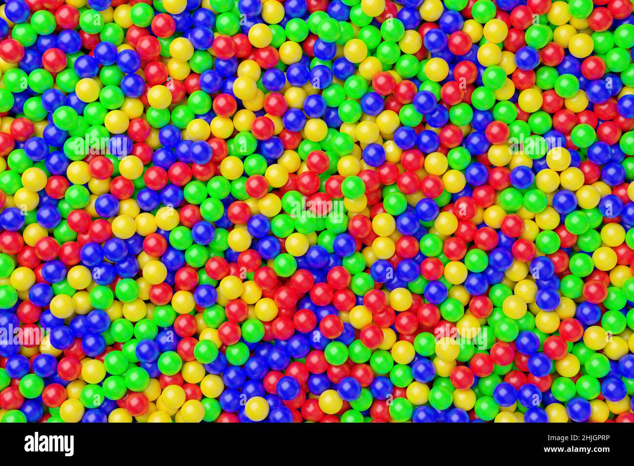 Ball pool or pit filled with red, green, yellow and blue plastic balls ...