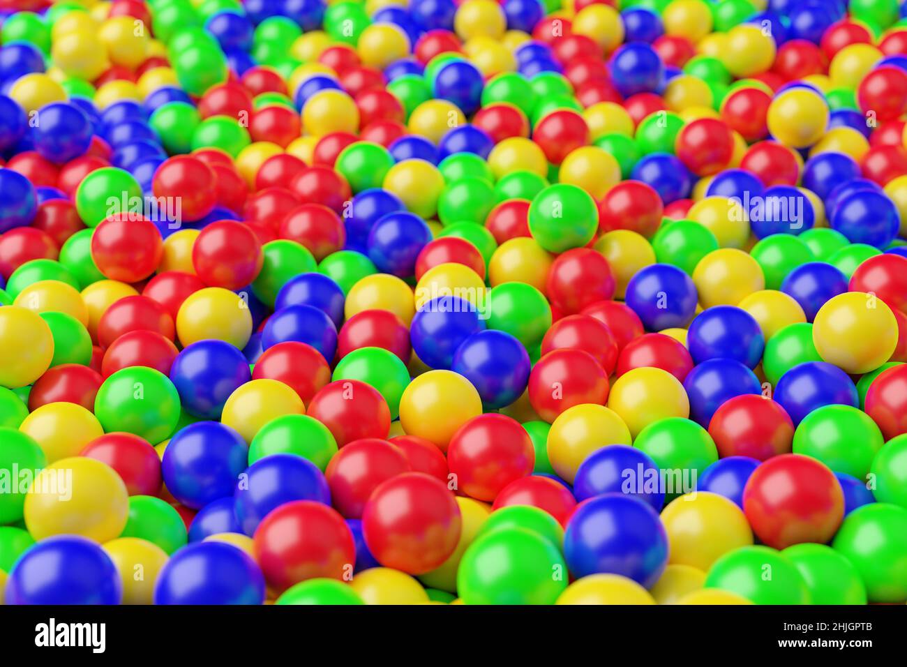 Ball pool or pit filled with red, green, yellow and blue plastic balls ...