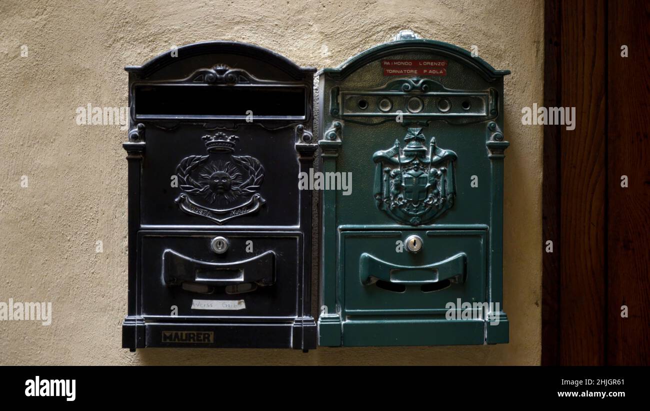 Old mailbox on the wall. Action. Vintage mailboxes in Europe. Postbox ...