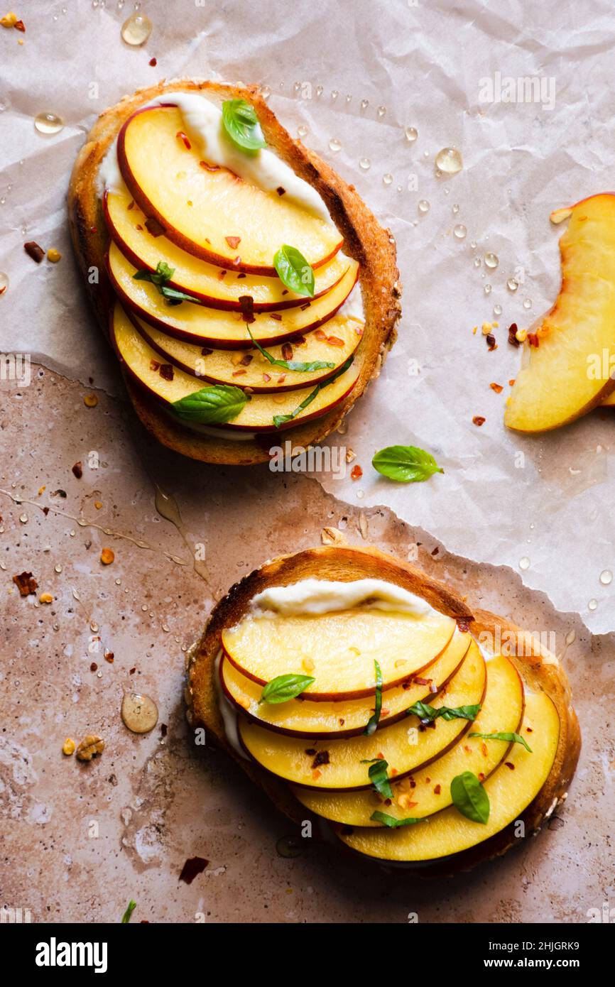 summer breakfast toasts with peaches Stock Photo - Alamy