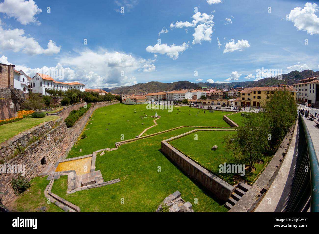 Aerial beautiful landscape view of green grass fields, houses mountains ...