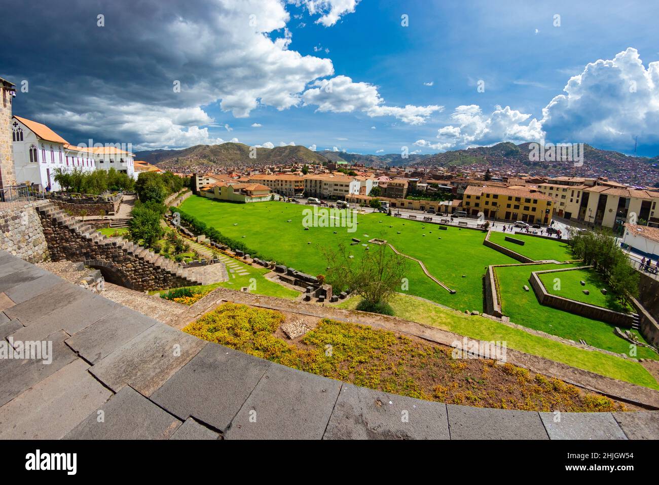 Aerial beautiful landscape view of green grass fields, houses mountains ...
