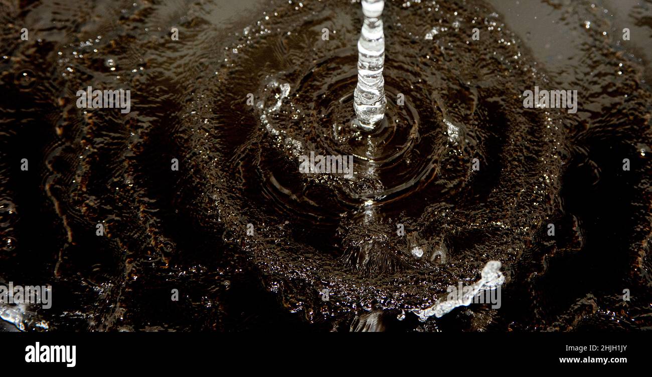 Grayscale of flowing water splash Stock Photo - Alamy