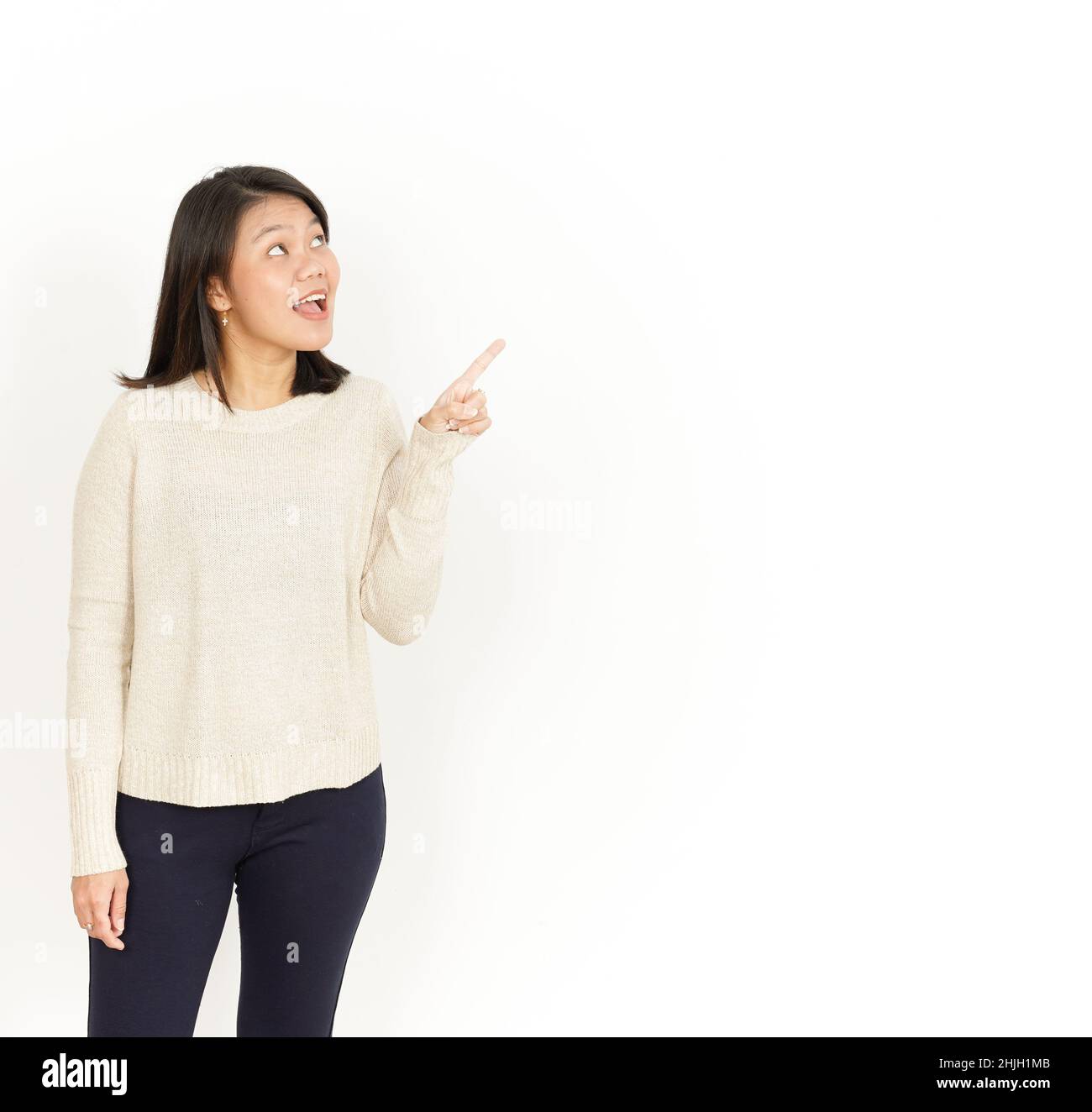 Pointing aside and Showing Product of Beautiful Asian Woman Isolated On ...