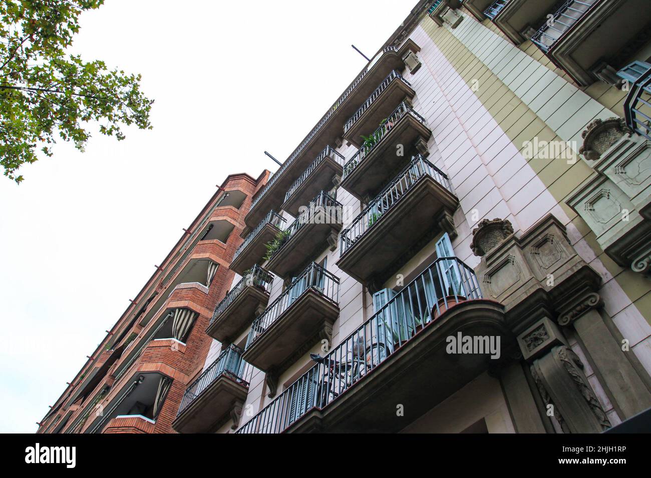 House with balconies. Bottom view Stock Photo - Alamy