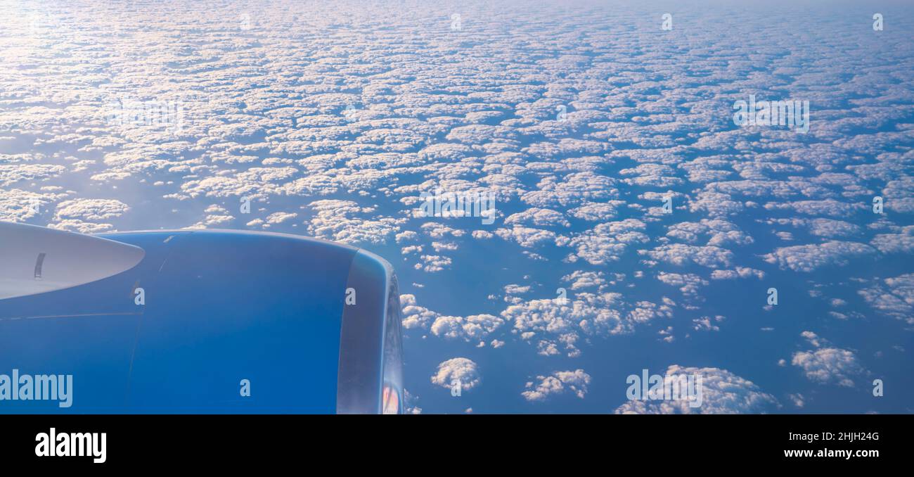 View of airplane engine and clouds over the sea, Atlantic Ocean, Europe ...