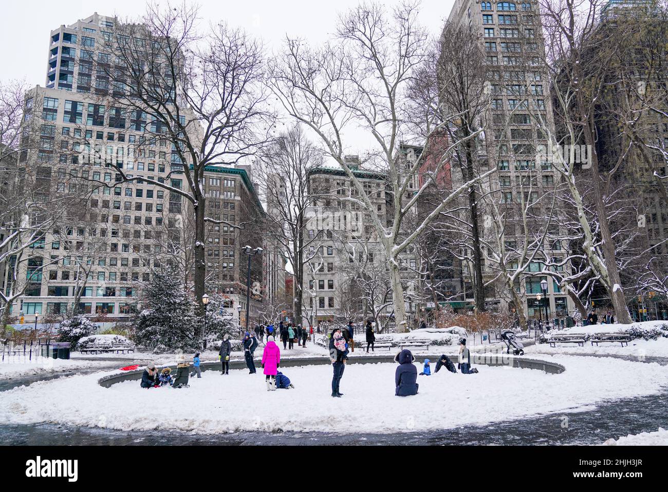 New Yorkers enjoying snow in Madison Square Park in New York, after ...