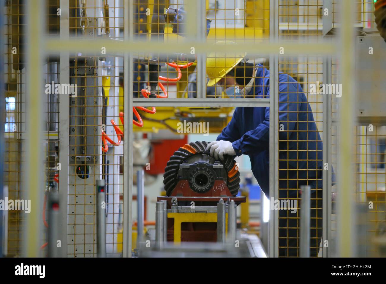 QINGDAO, CHINA - JANUARY 20, 2022 - A quality inspector inspects parts ...