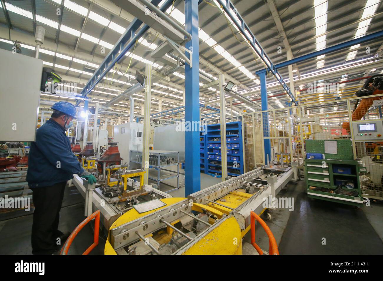 QINGDAO, CHINA - JANUARY 20, 2022 - An assemblyman performs a pre ...