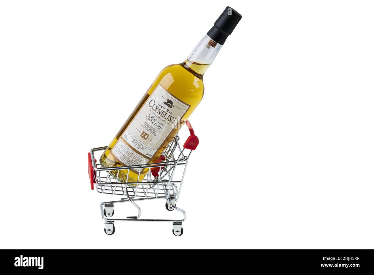 Close up view of shopping cart filled with single malt coastal highland ...