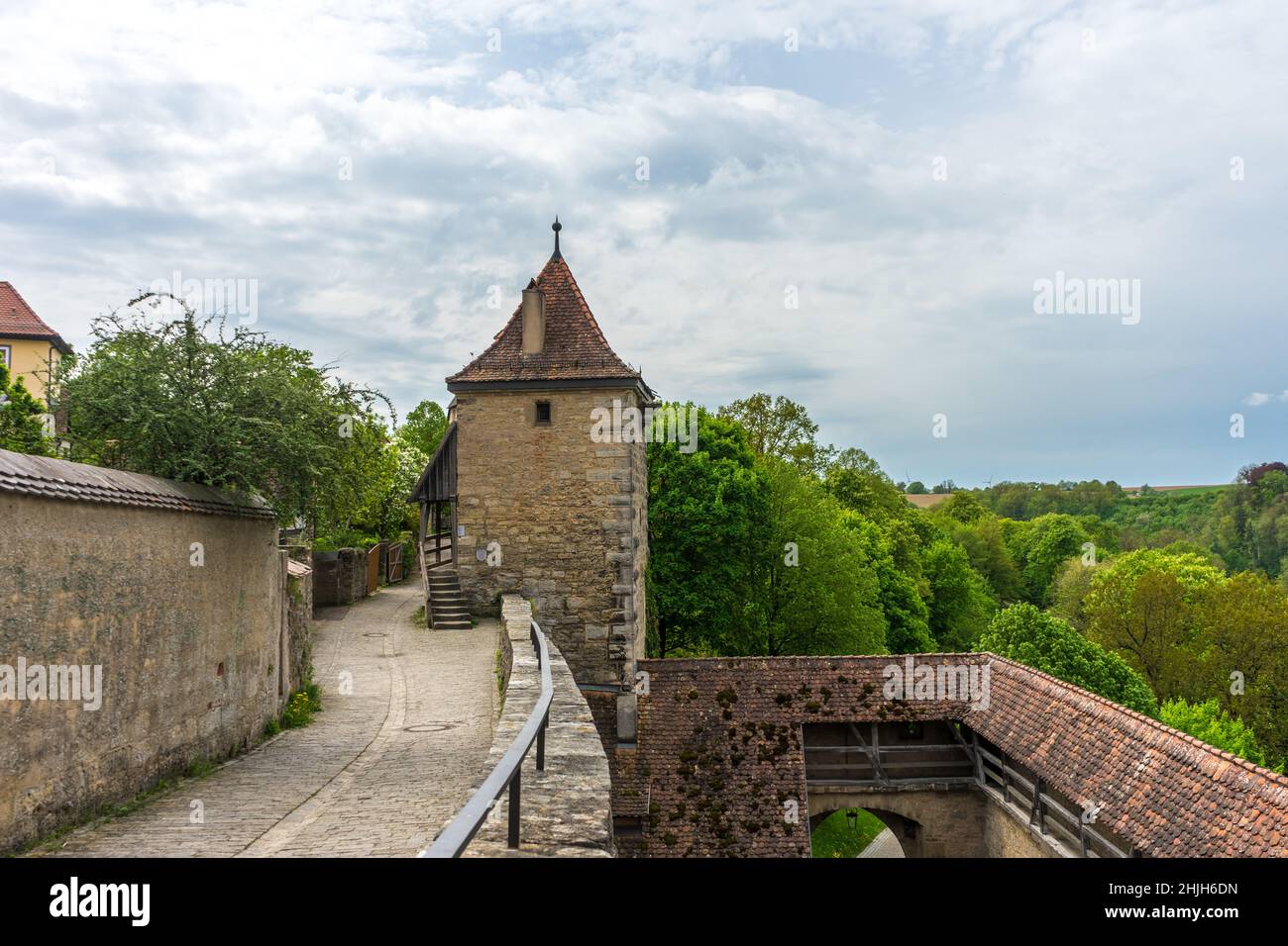 Old stone bridge trail in Rothenburg ob der Tauber, Germany Stock Photo ...