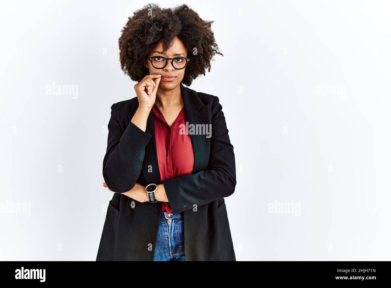 African american woman with afro hair wearing business jacket and ...