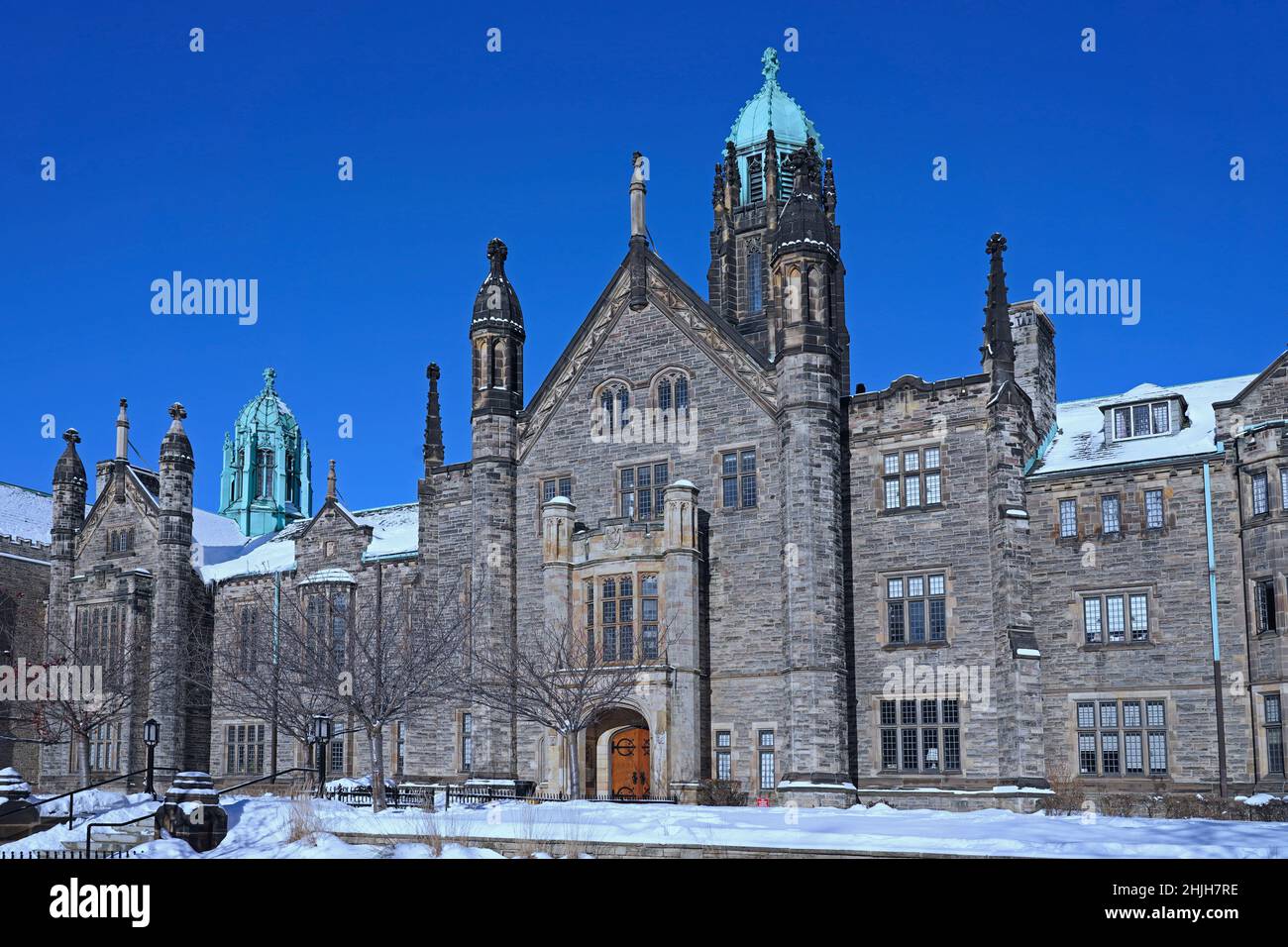 Front of old stone gothic style college building at the University of ...