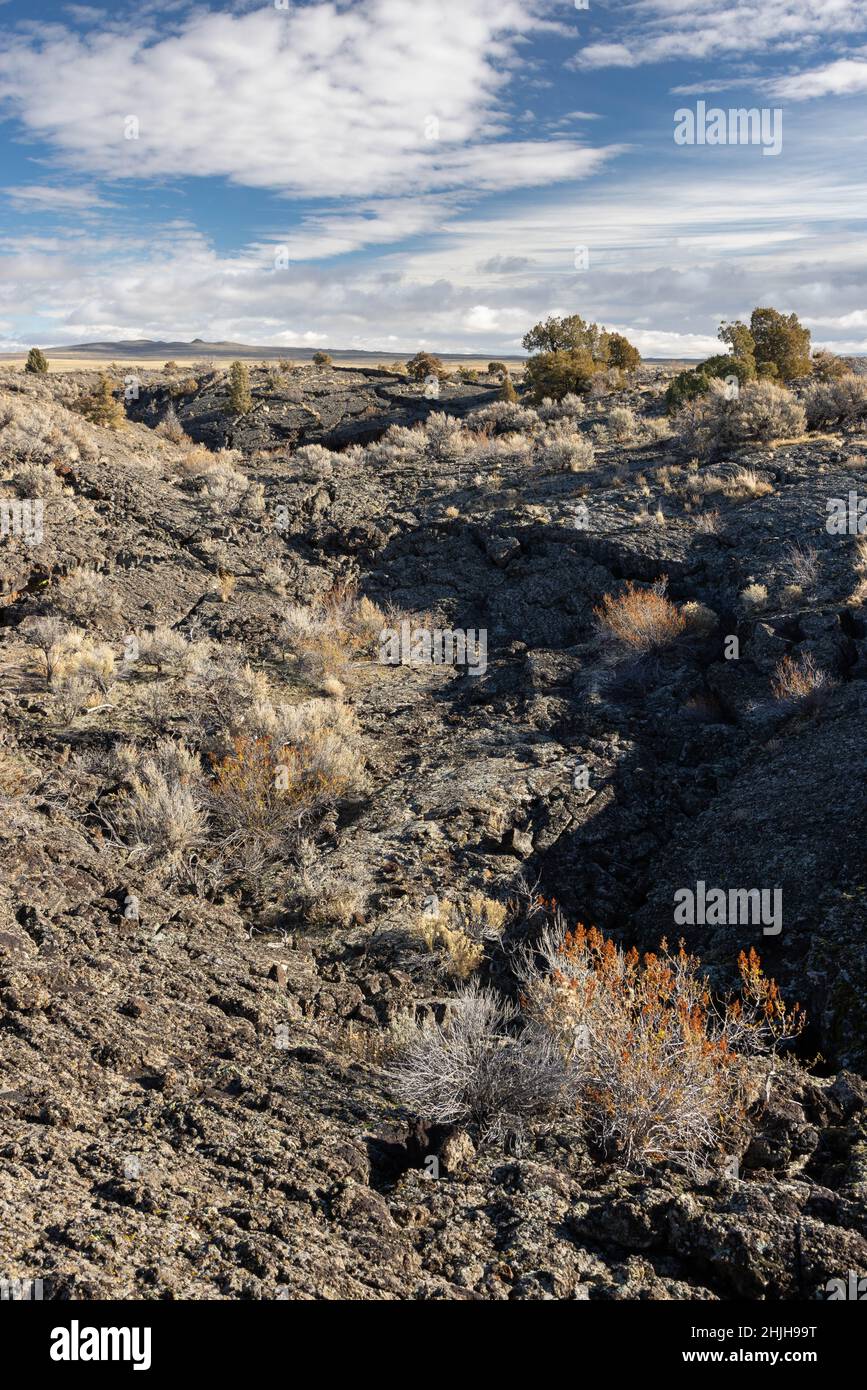 Hills of lava receding into the horizon along the Twenty Mile Trail. Hells Half Acre, Idaho ...