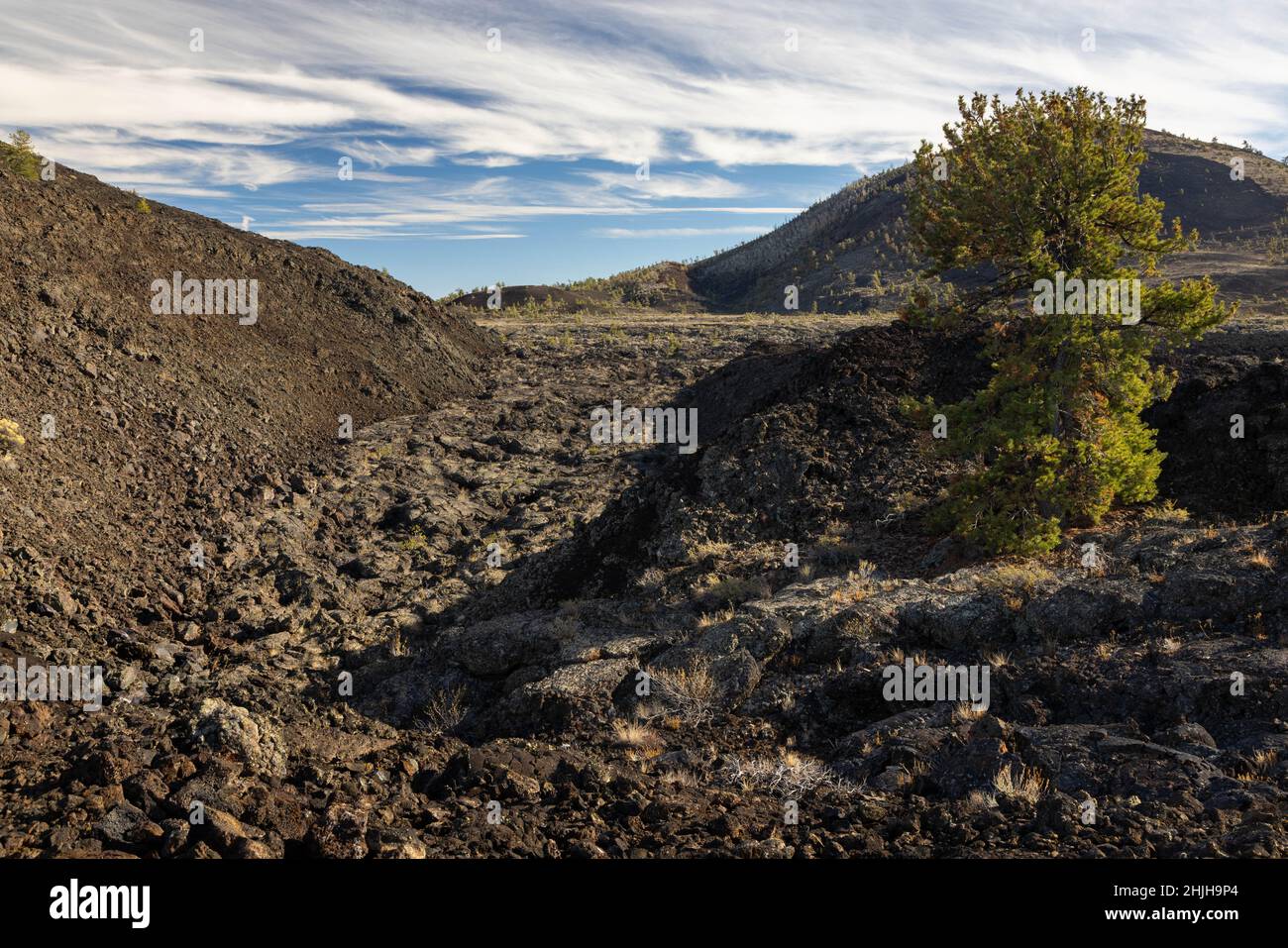 A rift in the lava known as the Great Rift at the base of Broken Top ...