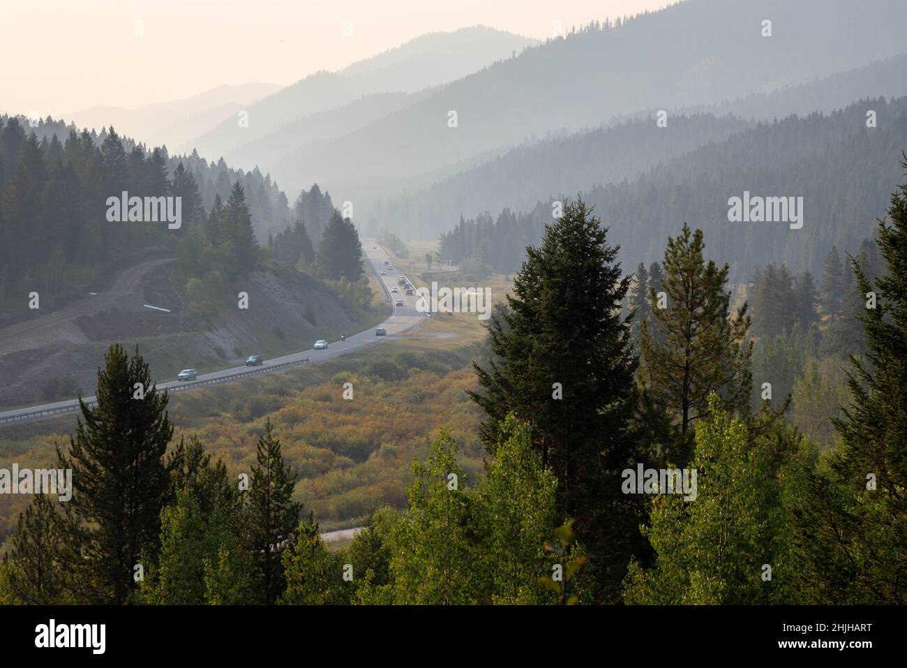 Highway 31 winding between the Teton and Snake River Mountains as ...