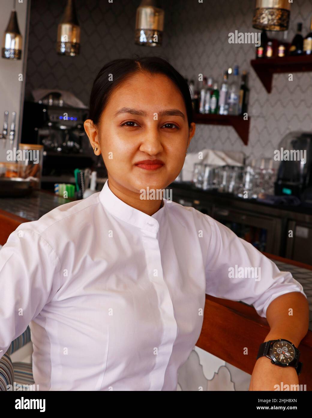 beautiful indian asian waitress in close up with white sleeve dress ...