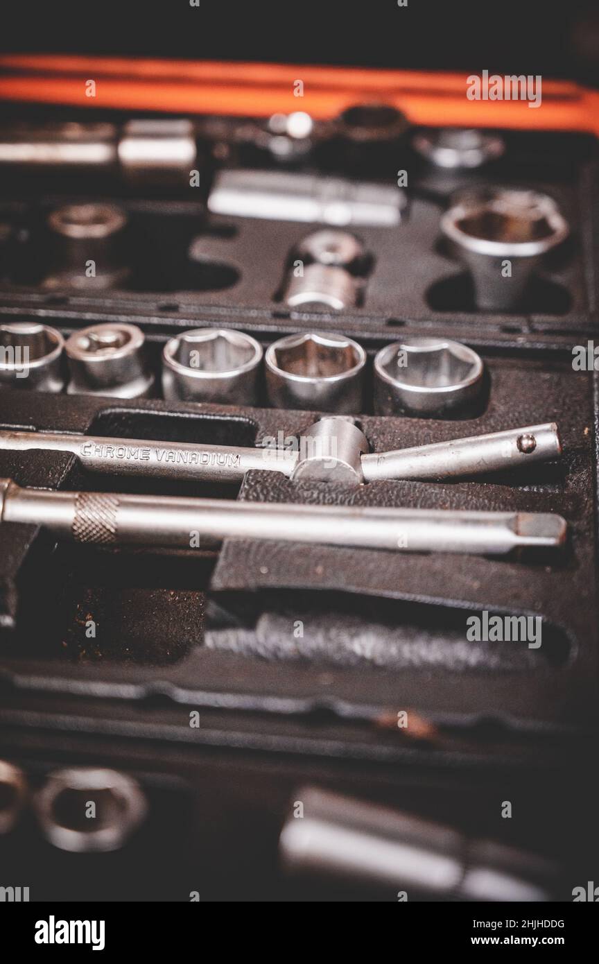 Vertical of metallic instrument set in a black box Stock Photo - Alamy