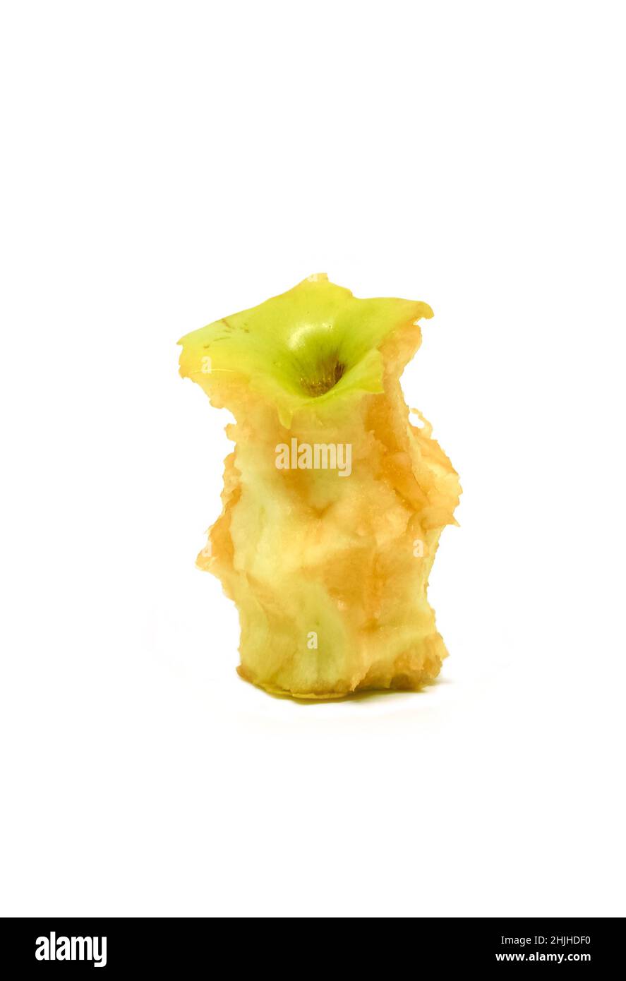 A green apple core in close-up isolated on a white background Stock ...