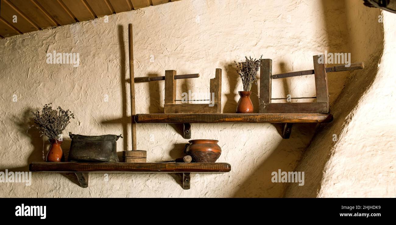 Old village vases on wooden racks. Can be used as a whole background ...