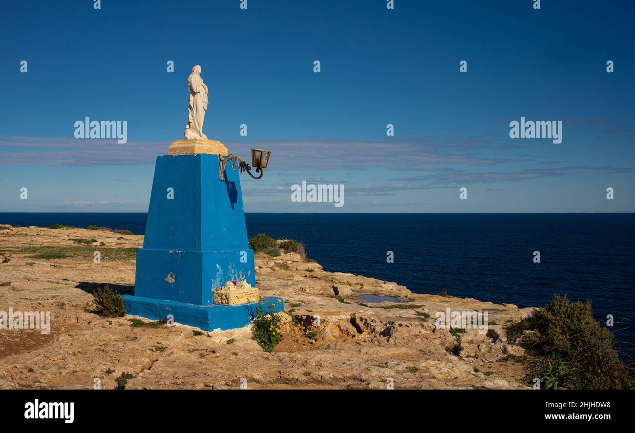 Statue of our lady on a cliff in Malta Stock Photo - Alamy
