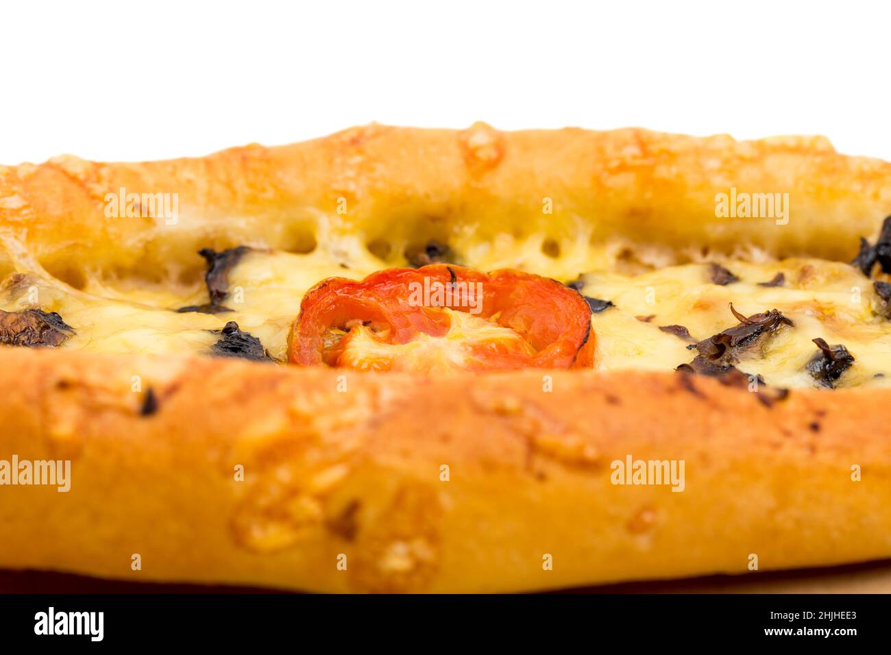 Delicious pie with tomatoes and cheese. Macro. Can be used as a whole ...