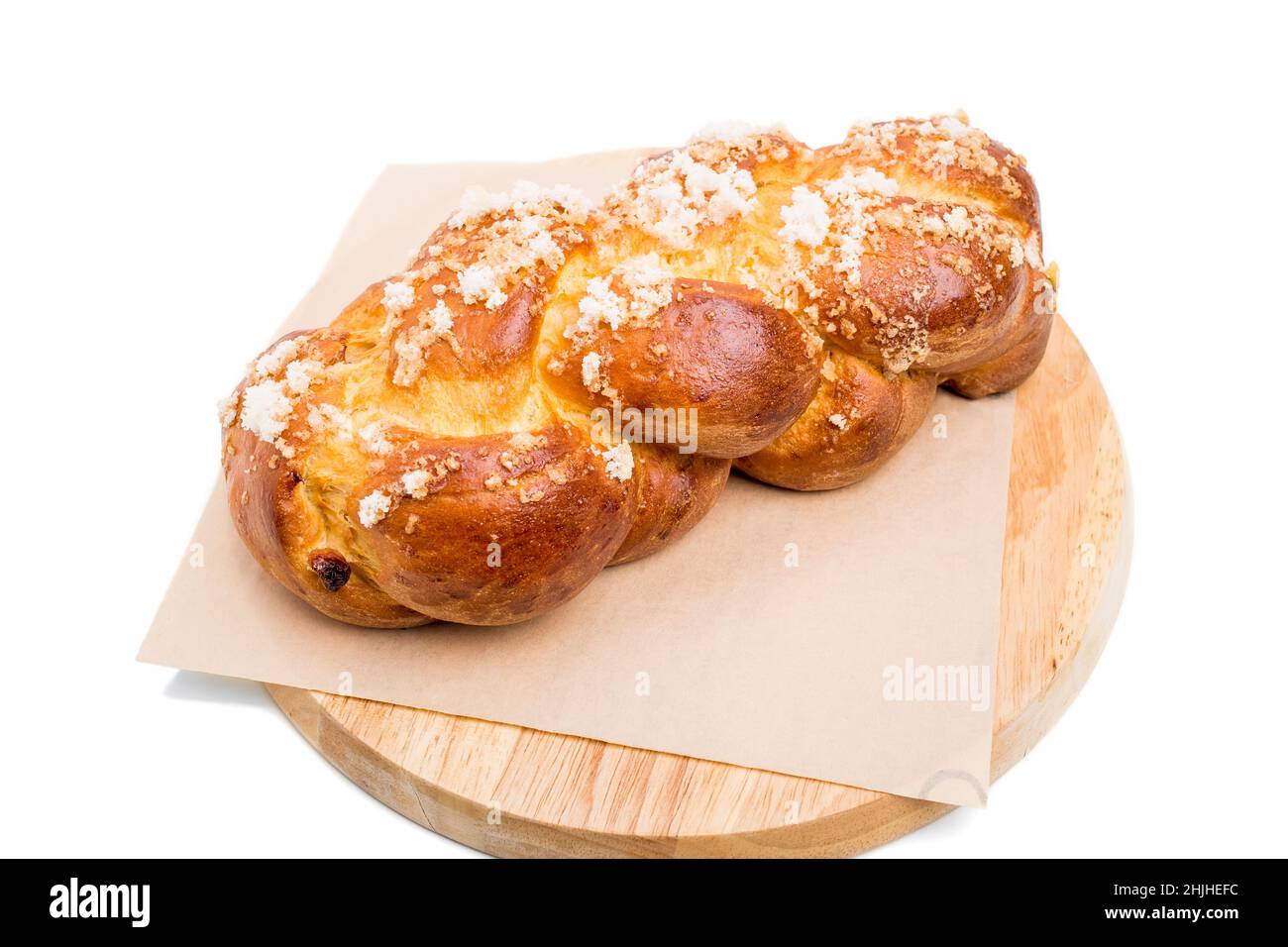 Sweet braided bread with crunchy sugar. Isolated on a white background ...