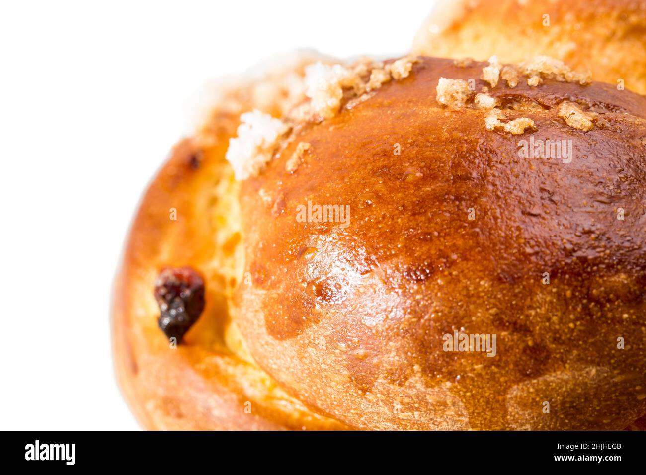 Sweet braided bread with crunchy sugar. Macro. Can be used as a whole ...