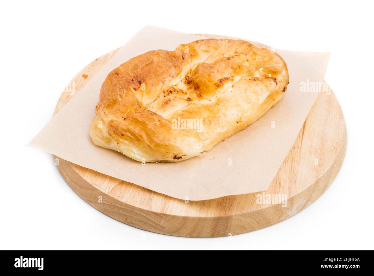 Placinta cake filled with a soft cheese as a romanian cuisine. Isolated ...