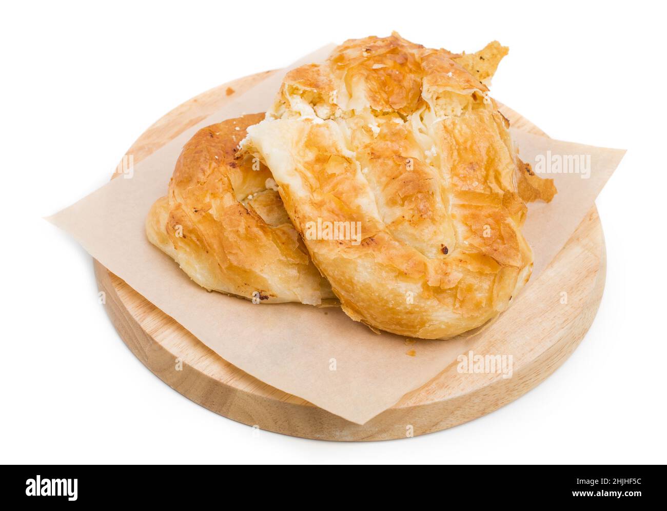 Placinta cake filled with a soft cheese as a romanian cuisine. Isolated ...