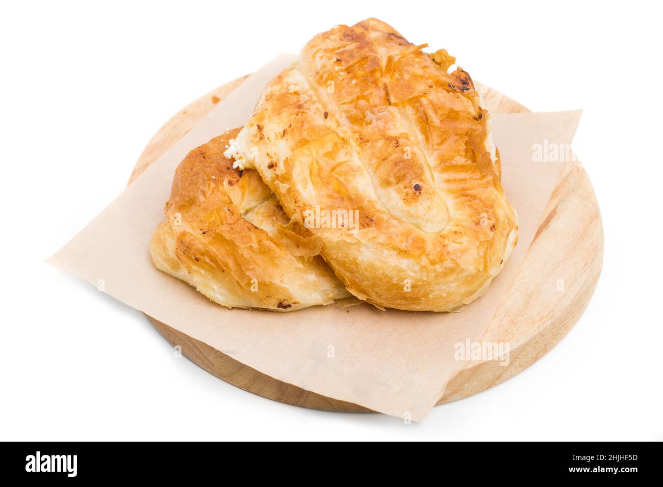 Placinta cake filled with a soft cheese as a romanian cuisine. Isolated ...