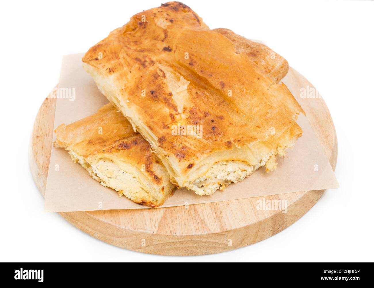 Placinta cake filled with a soft cheese as a romanian cuisine. Isolated ...