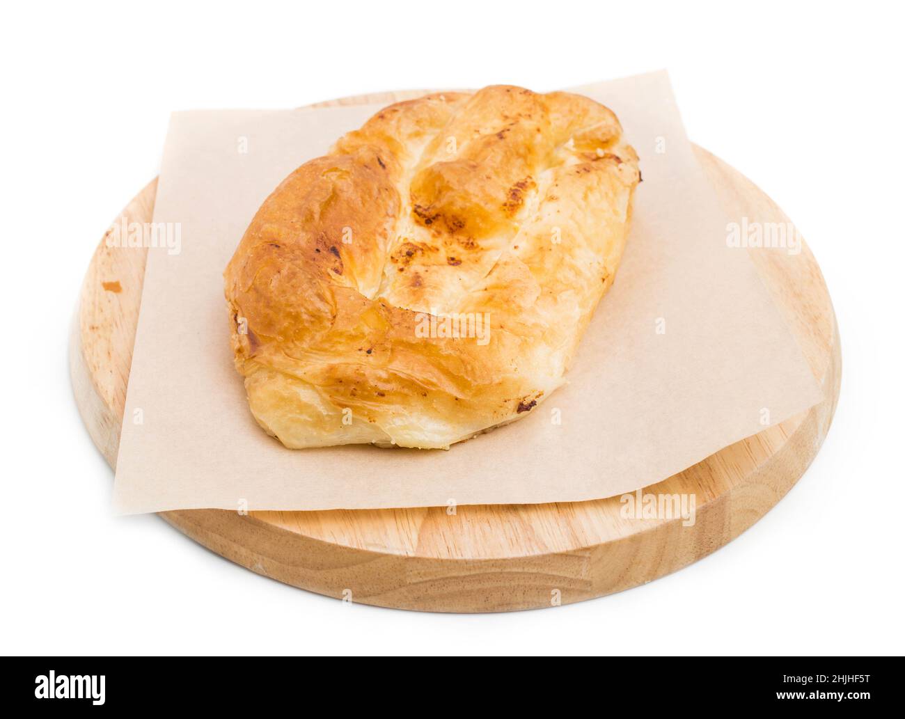 Placinta cake filled with a soft cheese as a romanian cuisine. Isolated ...
