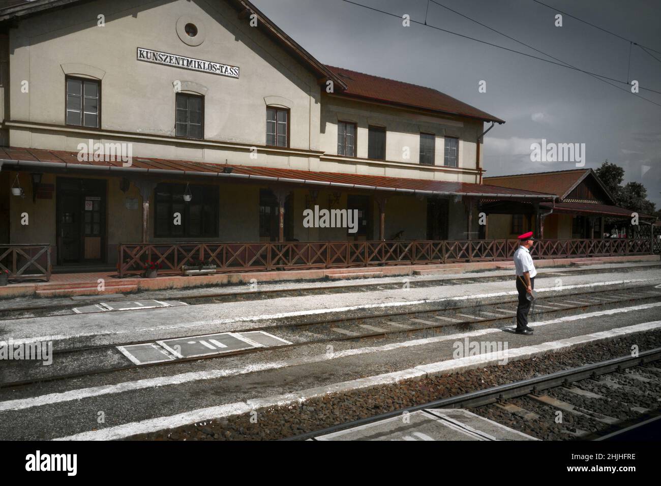 Inspector meets the train in Hungarian outback railway station Stock ...