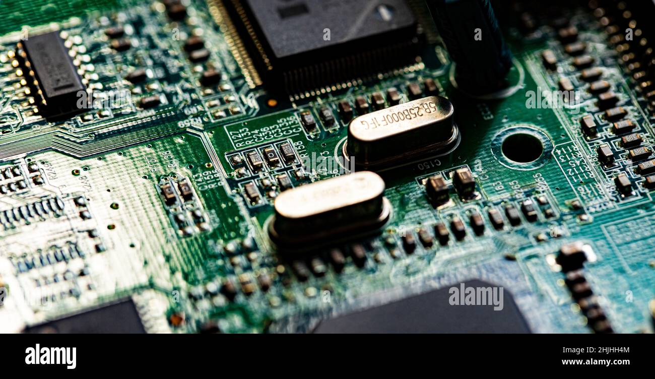 Macro Close up of components and microchips on PC circuit board of ...