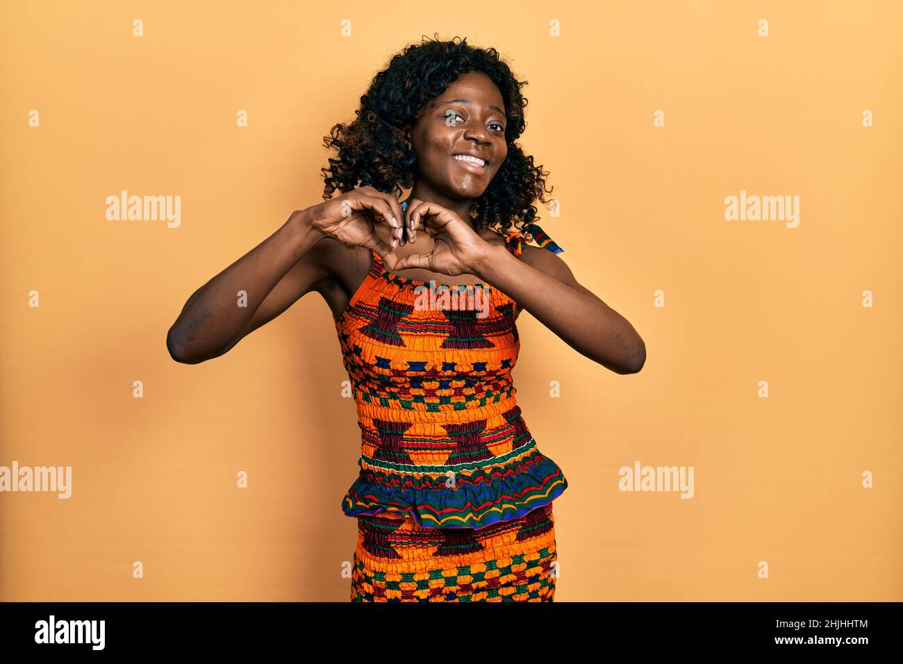 Young african american woman wearing traditional african clothes ...