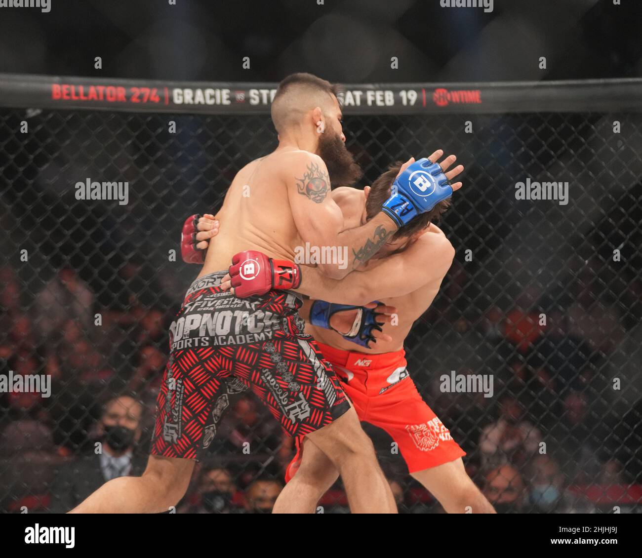 PHOENIX, AZ - JANUARY 29: (L-R) Ben Lugo battles Lucas Brennan in their ...
