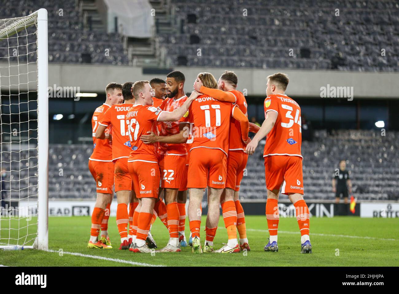 The Blackpool players join in as Josh Bowler #11 celebrates his goal to ...