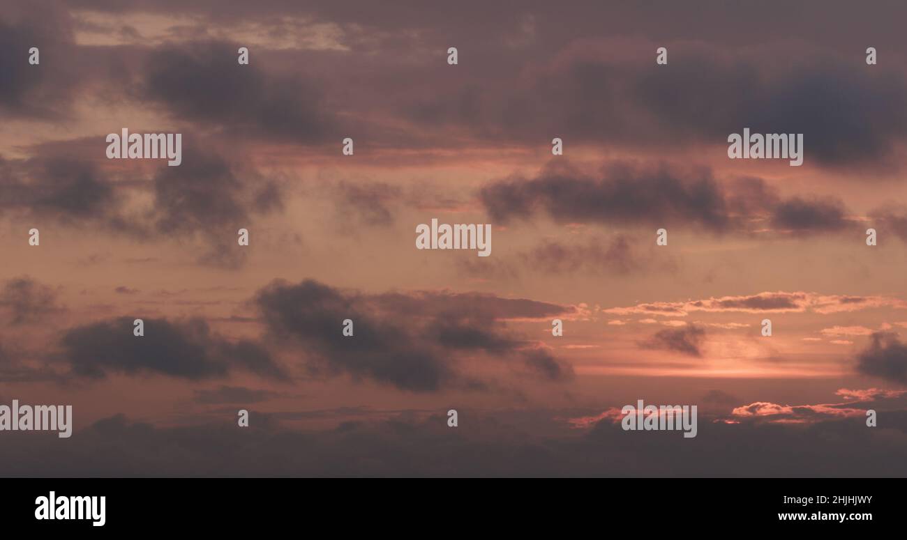 summer sunset skyscape with moving clouds, wide photo Stock Photo - Alamy