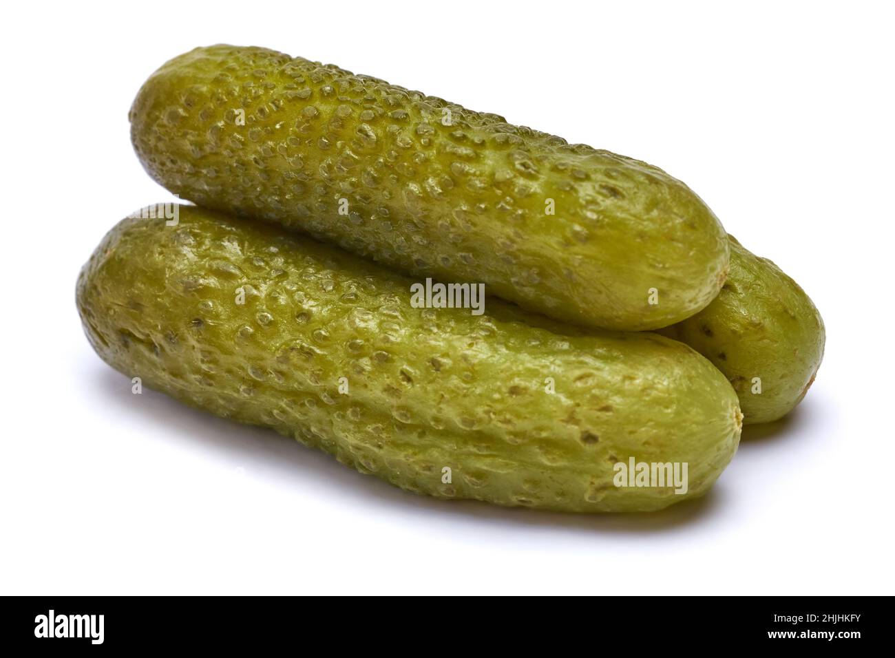 Tasty Whole green cornichon isolated on a white background Stock Photo ...
