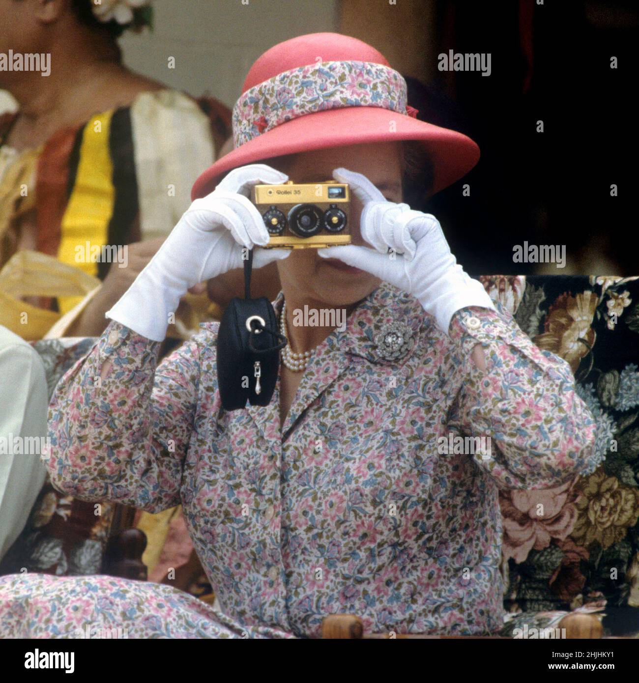 File photo dated 26/10/82 of Queen Elizabeth II taking photographs with ...