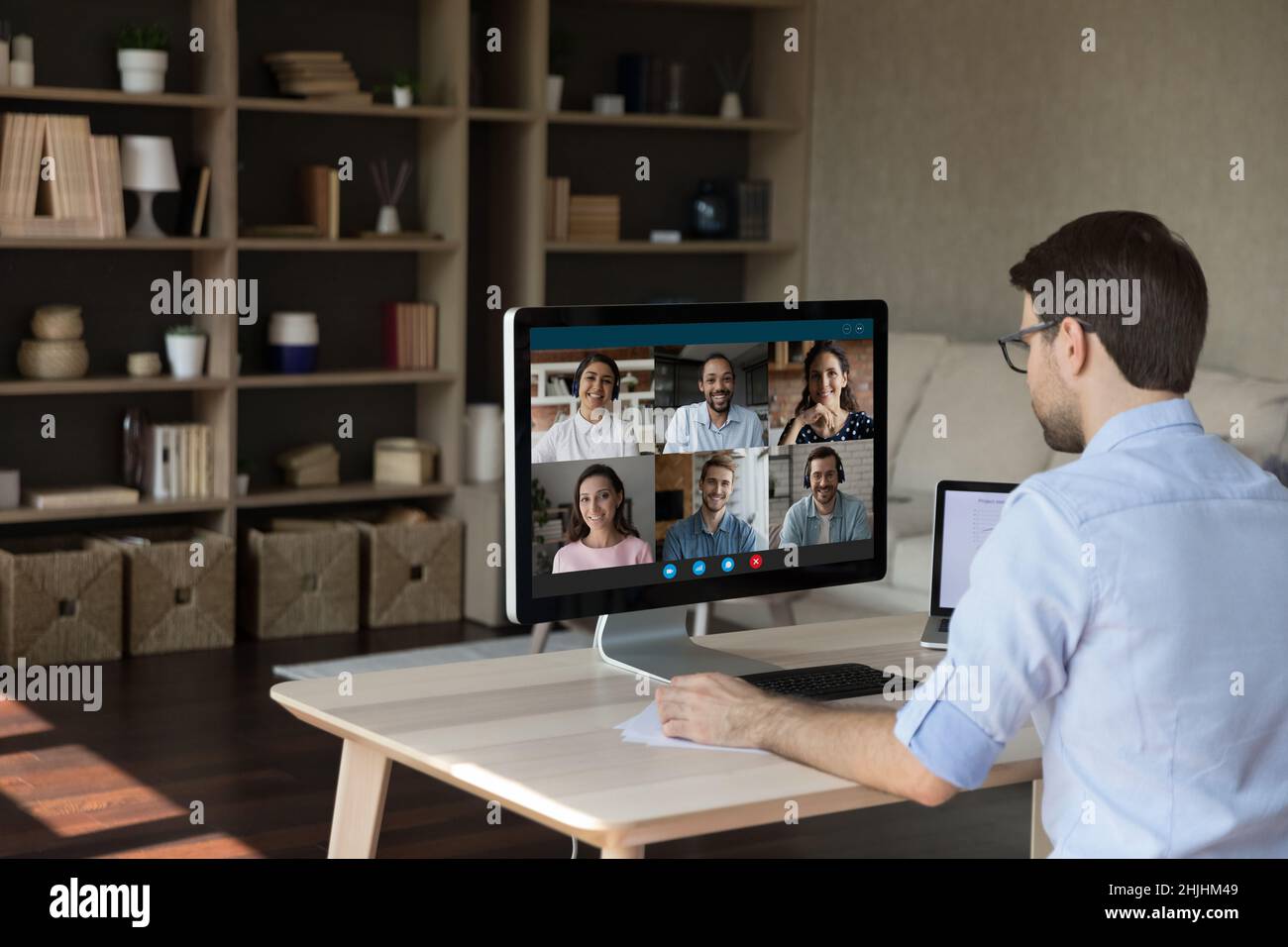 Focused young businessman holding video call conversation Stock Photo ...