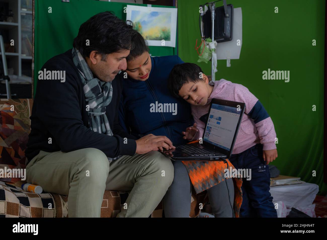 Parents teaching their child hi-res stock photography and images - Alamy