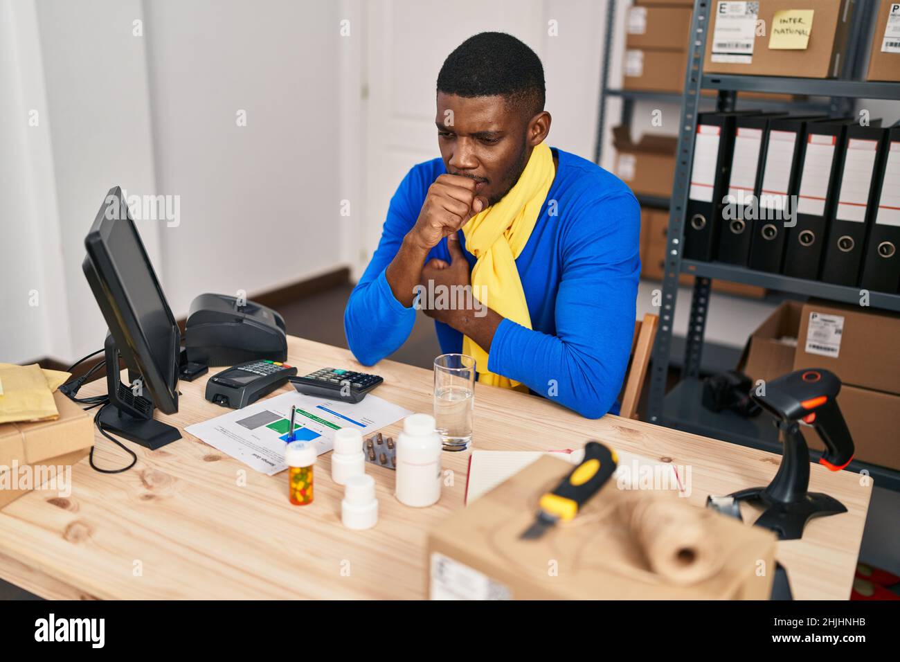 Young african american man ecommerce business worker coughing at office ...