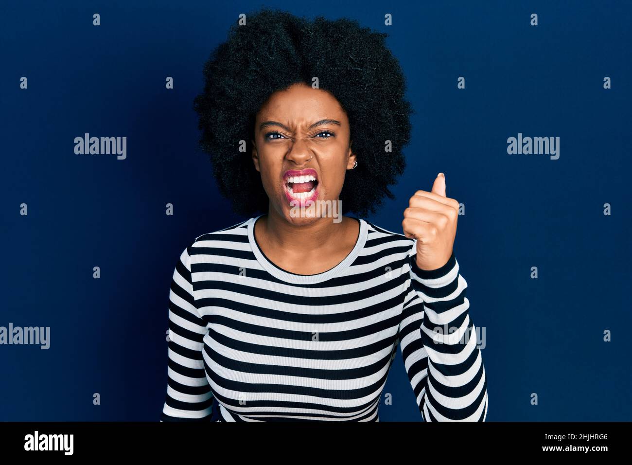 Young African American Woman Wearing Casual Clothes Angry And Mad